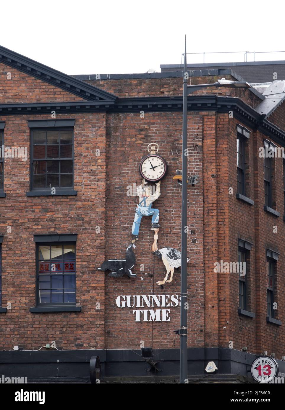 'Guinness Time' logo on the facade in Liverpool Stock Photo - Alamy