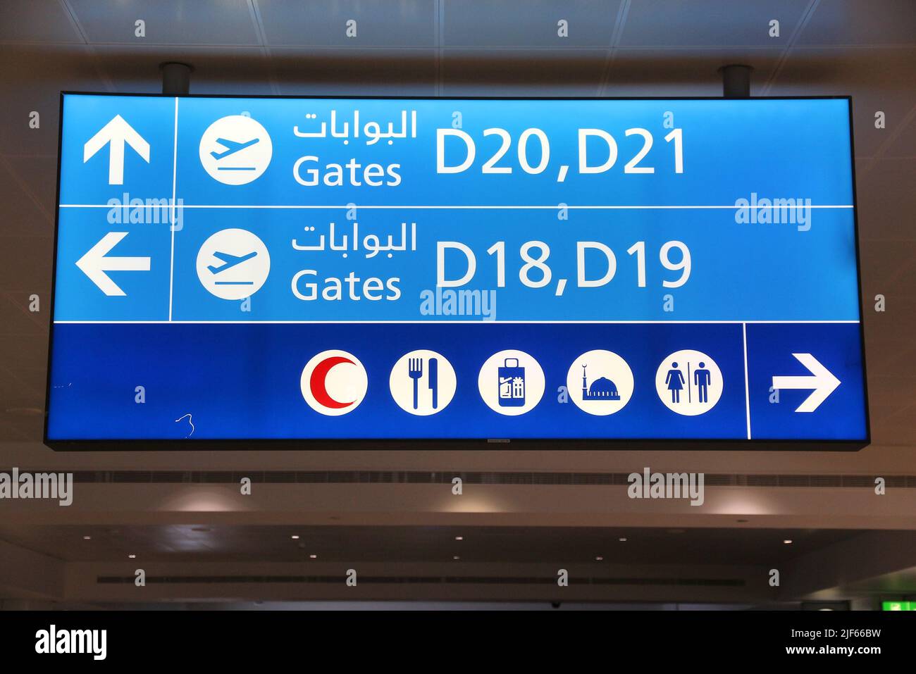 DUBAI, UAE - NOVEMBER 23, 2017: Gate signs at Dubai International ...
