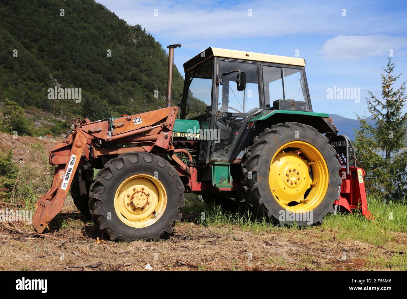 MORE OG ROMSDAL, NORWAY - JULY 26, 2020: John Deere tractor with a ...