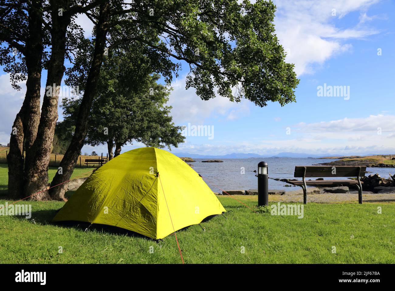 Norway campsite with small tent. Rennesoy island outdoor vacation ...