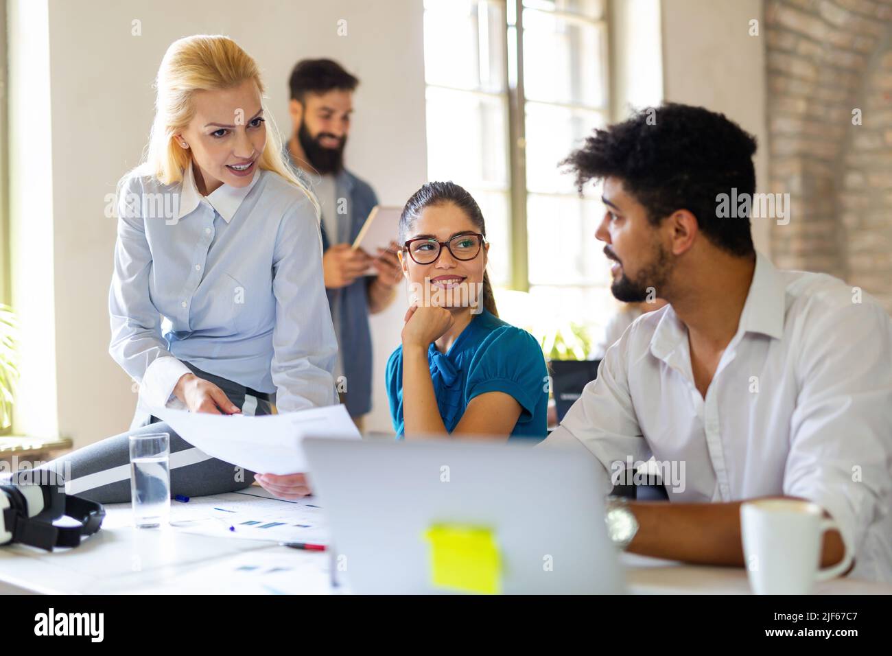 Group of success people working together at corporate workplace ...