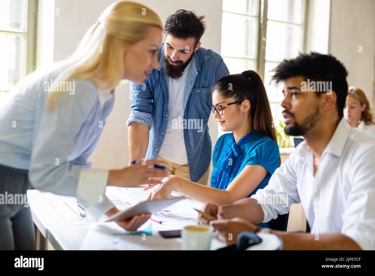 Startup diversity teamwork brainstorming meeting concept. Group of ...