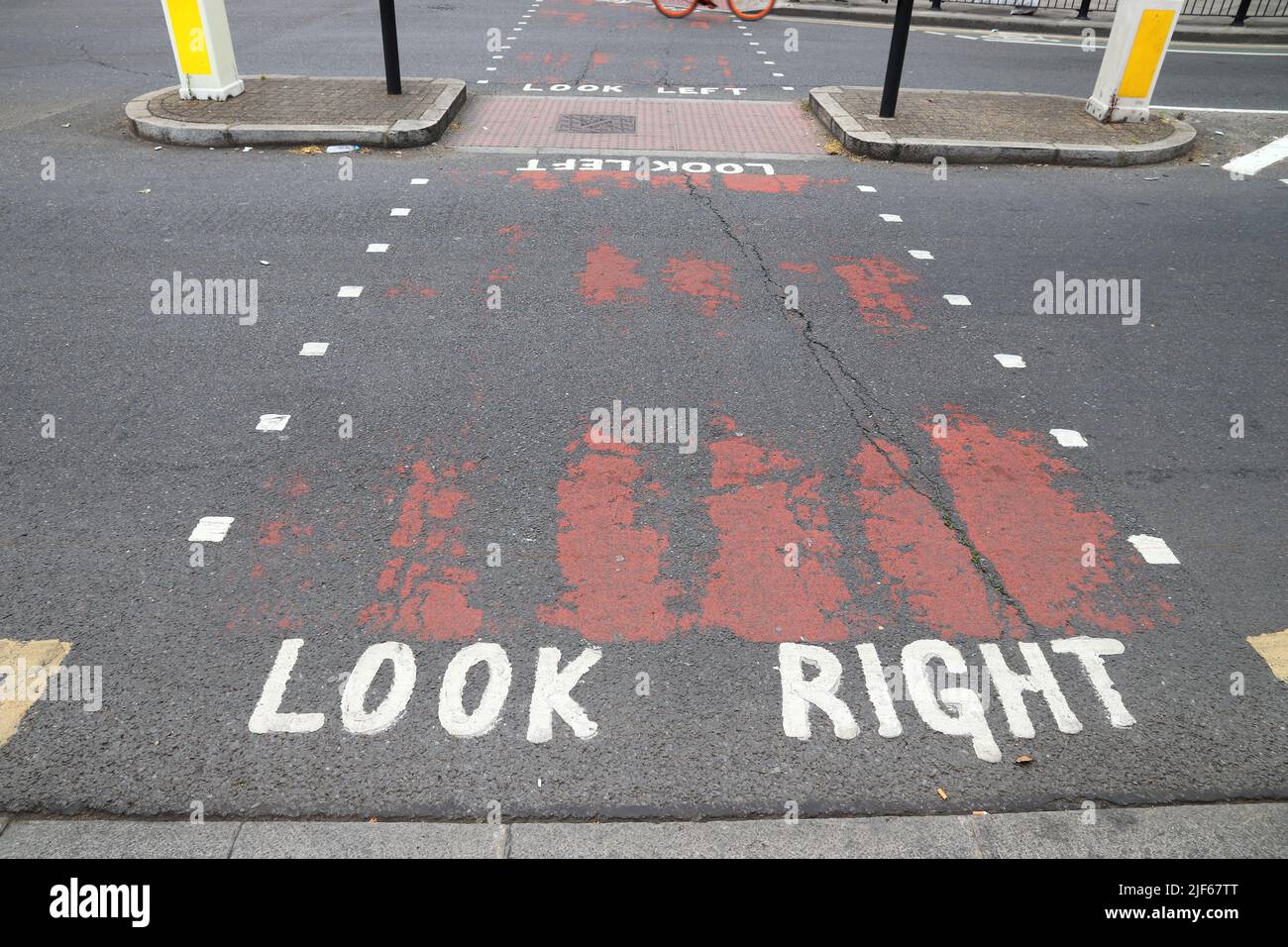 London UK pedestrian sign - look right at a pedestrian crossing ...