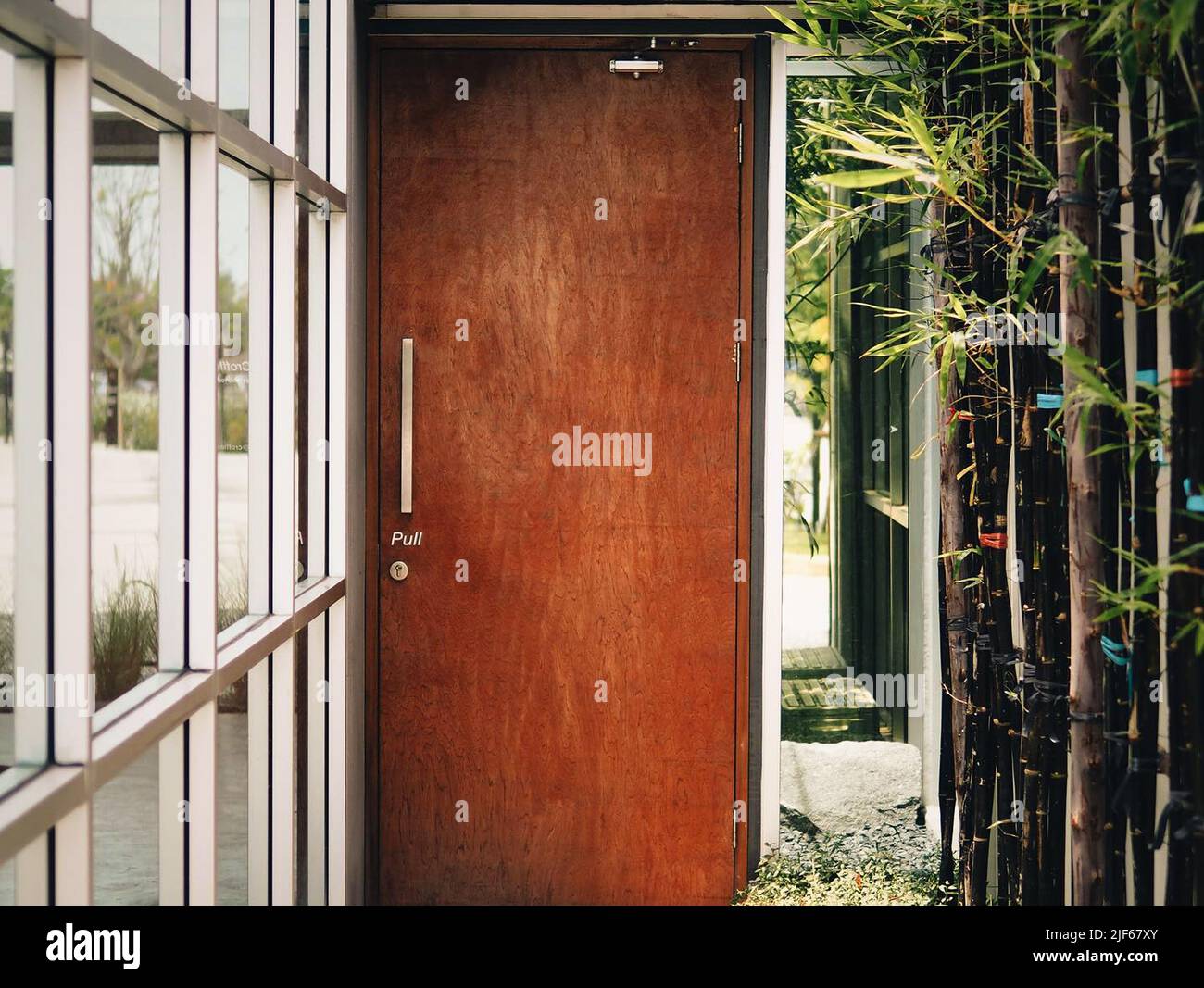 Facade of a retro cafe with a large window and a wooden door Stock ...