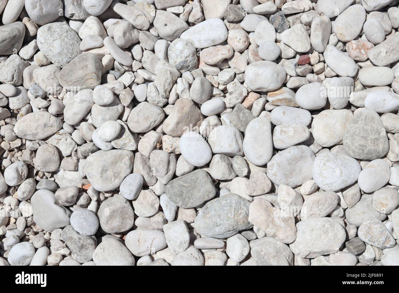 White zen stone beach in Croatia. Pebble background Stock Photo - Alamy