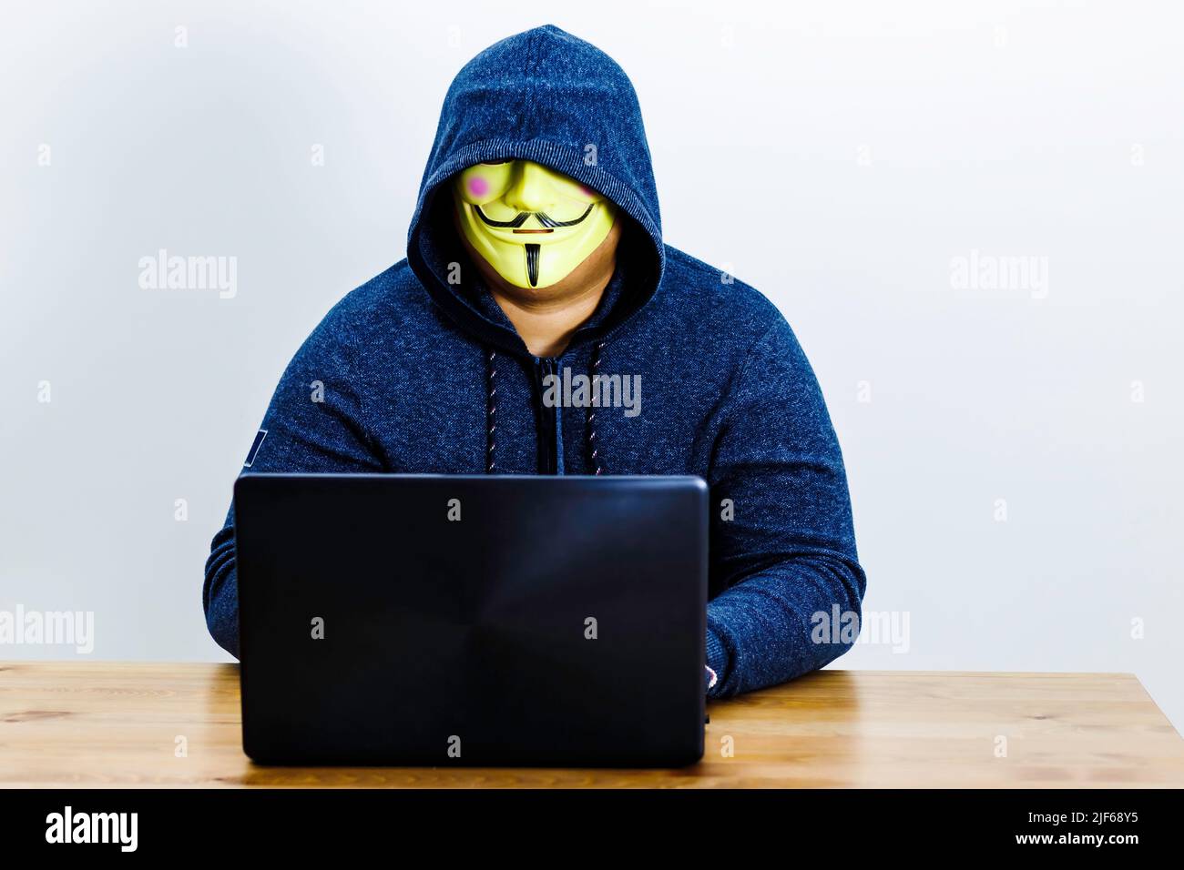 scammer calls the victim holding bank credit cards in his hand ...