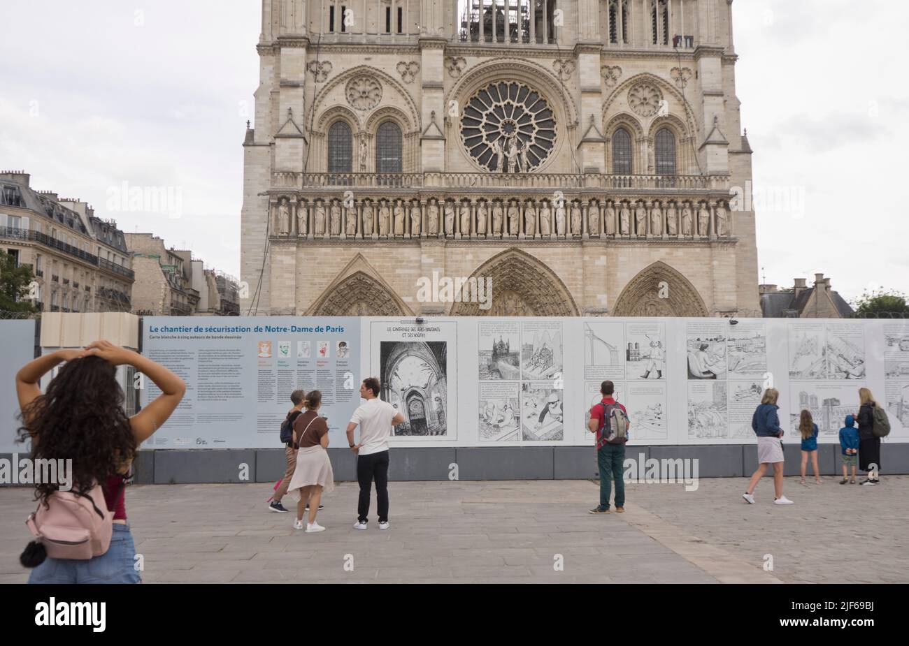 Visitors view the restoration of Notre Dame cathedral, partially ...