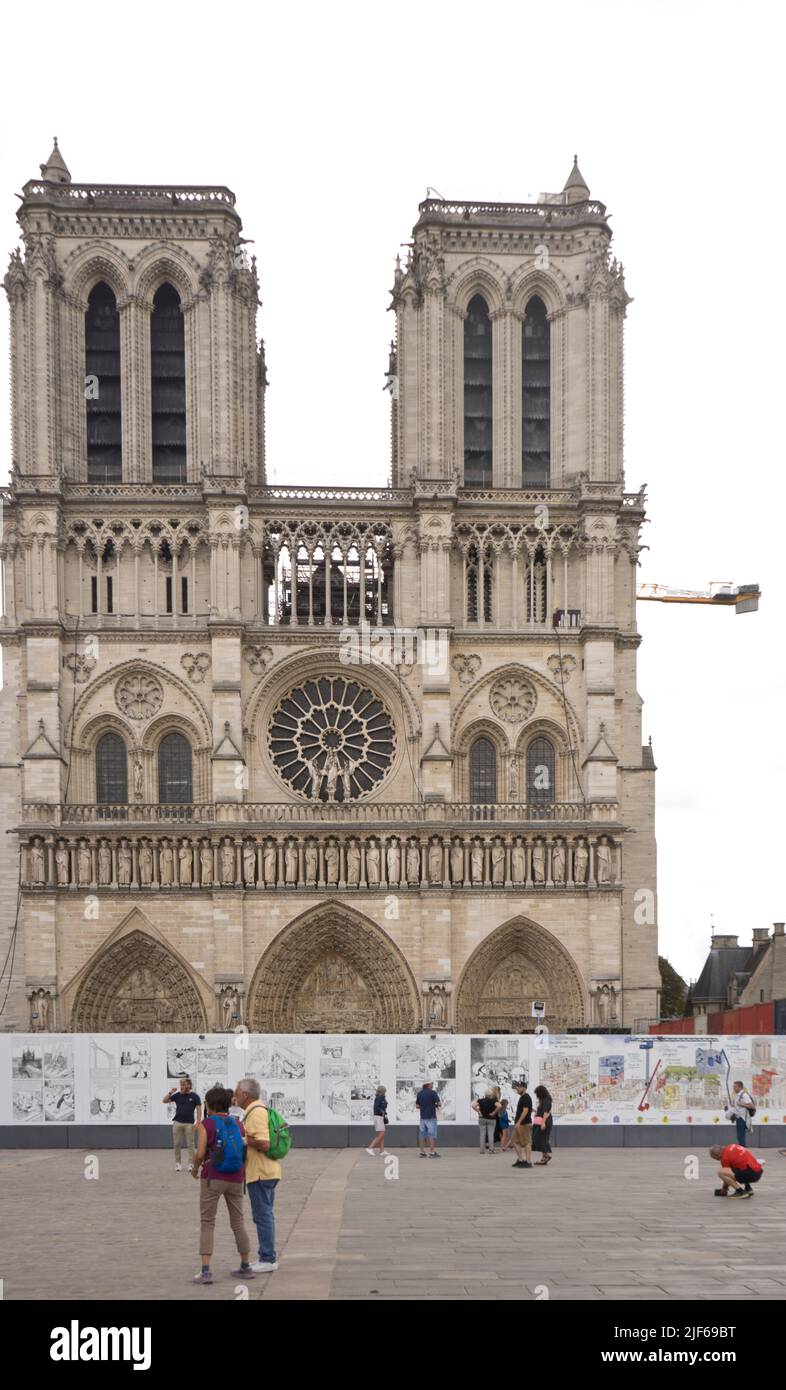 Visitors view the restoration of Notre Dame cathedral, partially ...