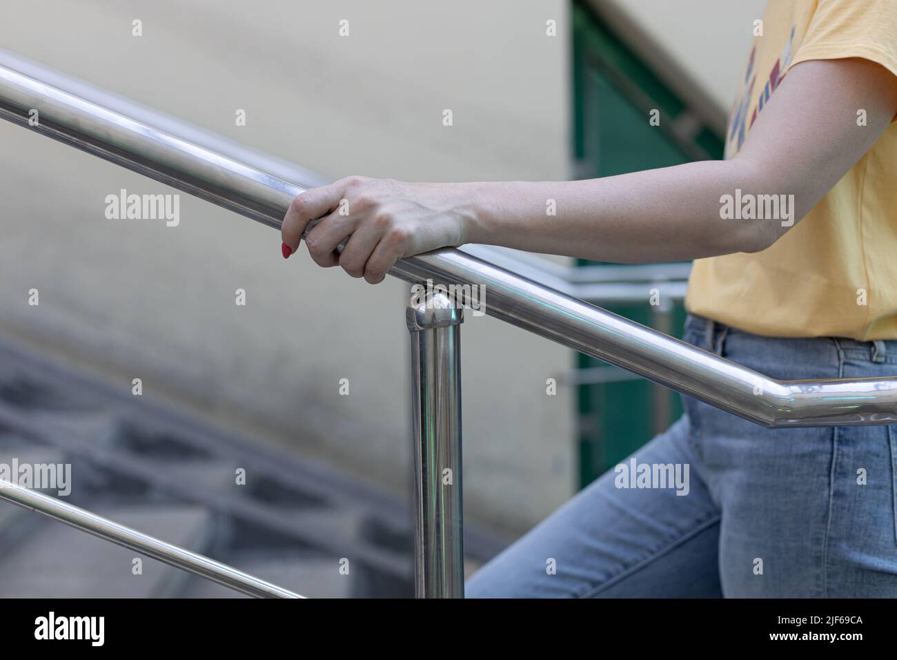 Arm holding ladder hi-res stock photography and images - Alamy