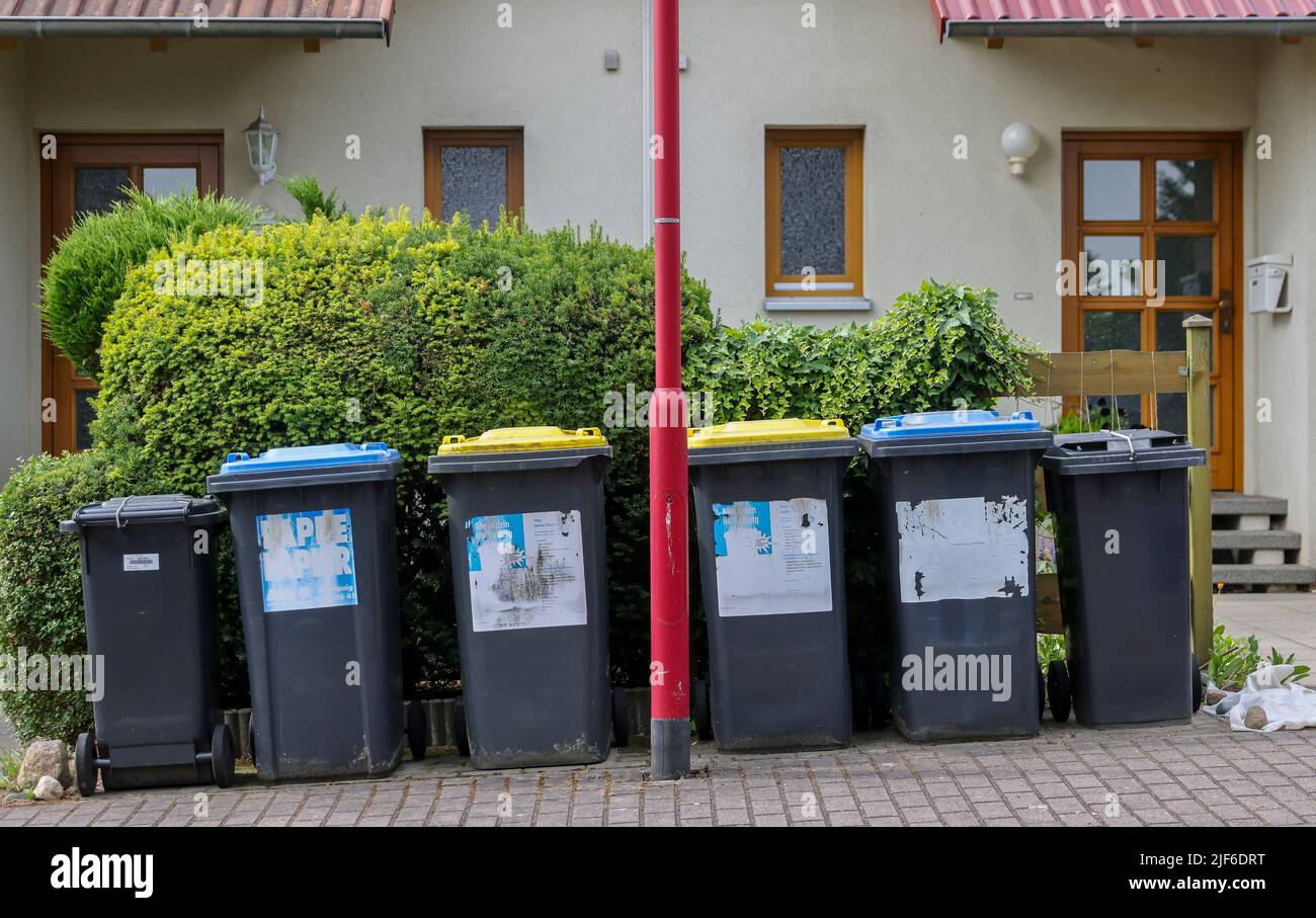 Leipzig, Germany. 30th June, 2022. Black garbage cans for residual ...