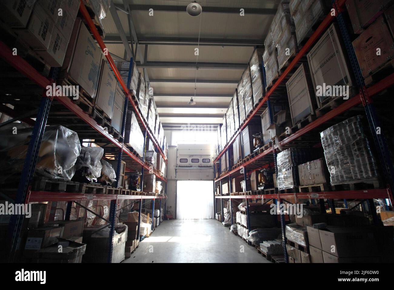 Goods and materials arranged on a rack in warehouse. Warehouse store ...