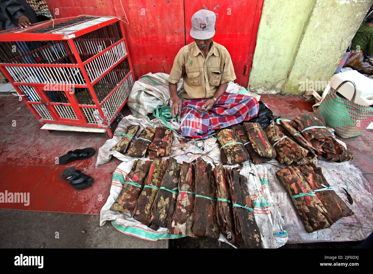 A man selling raw cinnamon barks at Bolu market, a traditional market ...