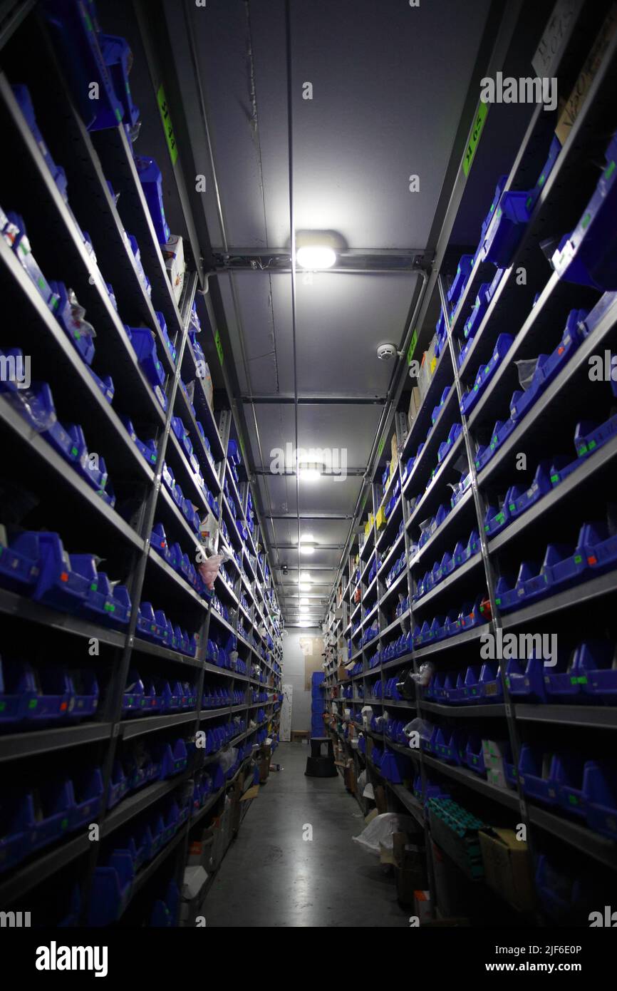 Goods and materials arranged on a rack in warehouse. Warehouse store ...