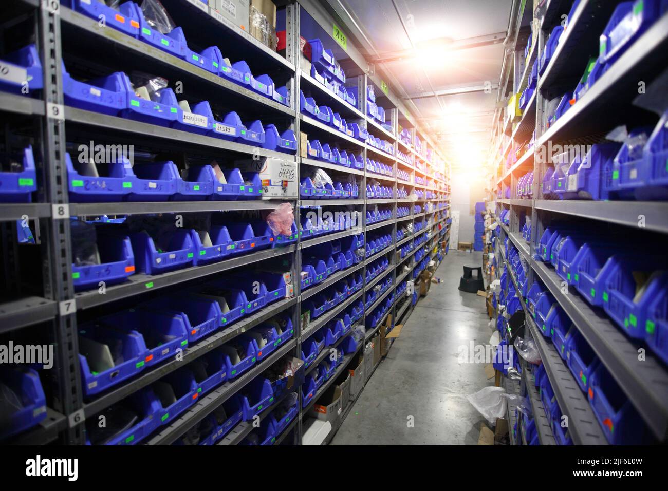 Goods and materials arranged on a rack in warehouse. Warehouse store ...