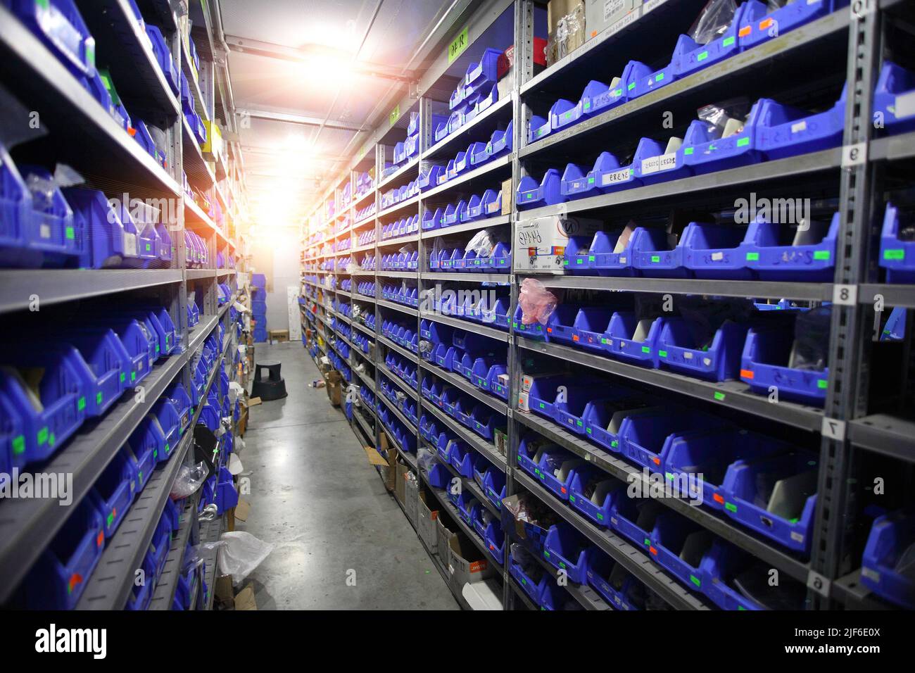 Goods and materials arranged on a rack in warehouse. Warehouse store ...