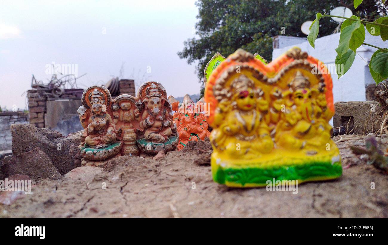 Beautiful clay statue Idol of an Indian god Lord Ganesha and laxmi ...