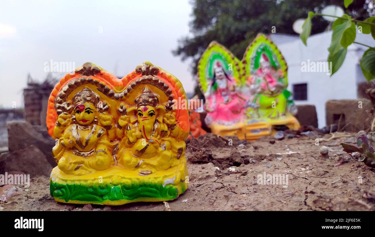 Beautiful clay statue Idol of an Indian god Lord Ganesha and laxmi ...