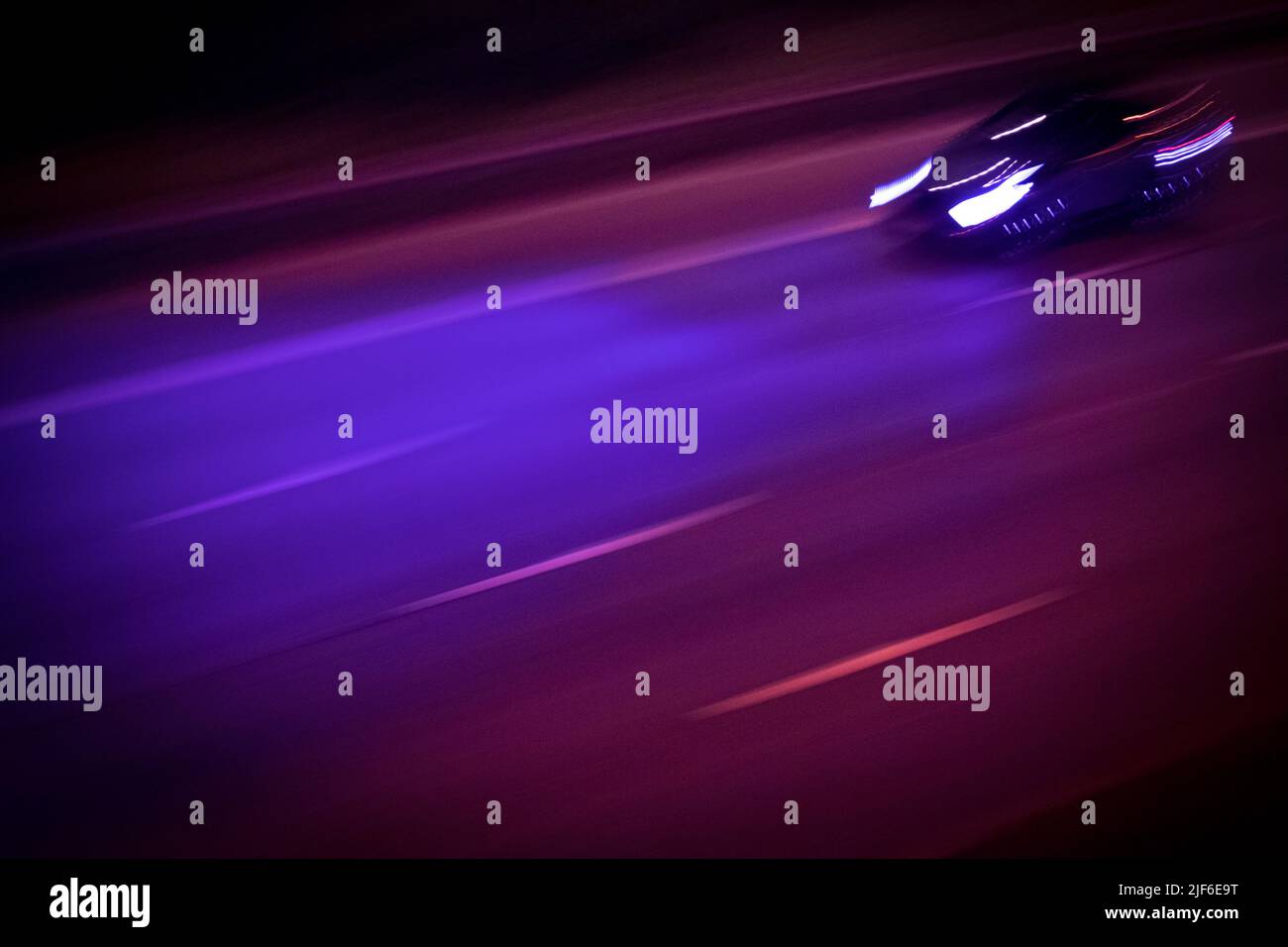 Abstract blurry car on empty highway Stock Photo - Alamy