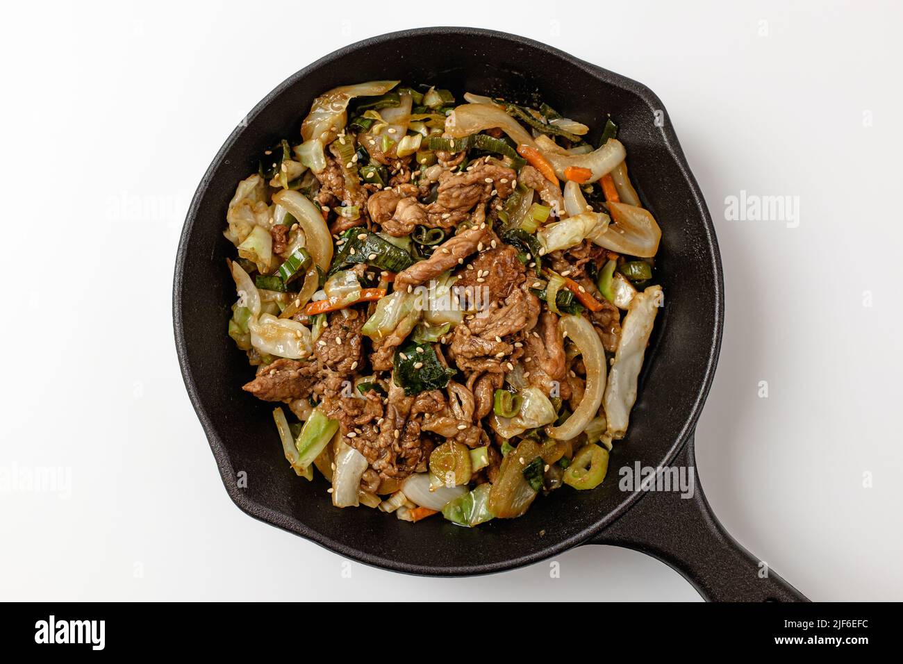 Pork bulgogi on a white background Stock Photo - Alamy