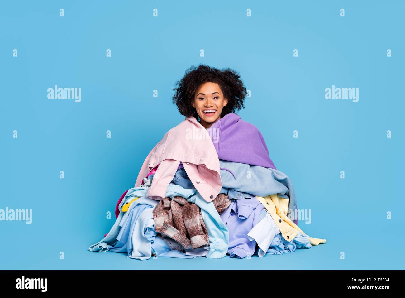 Photo of impressed excited impressed young lady covered large staff ...
