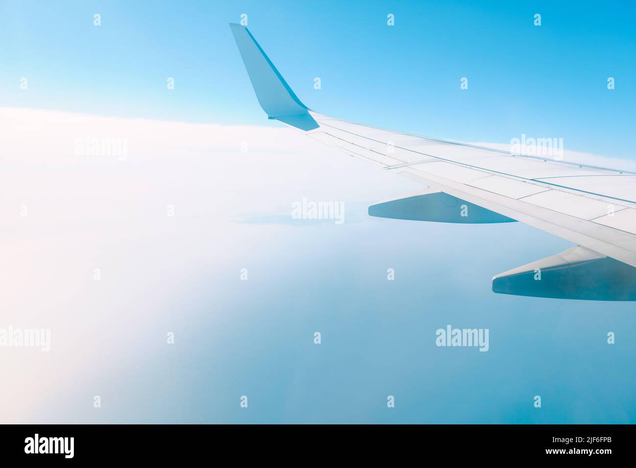 Aircraft Wing in Flight . View from the plane window Stock Photo - Alamy