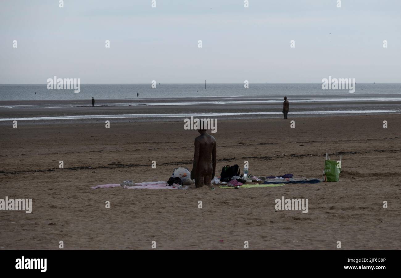 Antony Gormley Iron Man statues on Crosby Beach Liverpool Merseyside ...