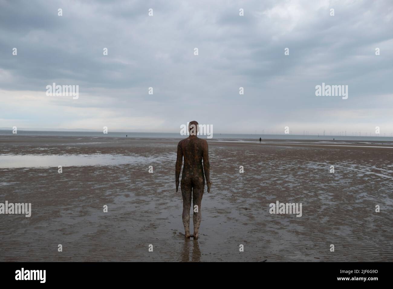 Antony Gormley Iron Man statues on Crosby Beach Liverpool Merseyside ...