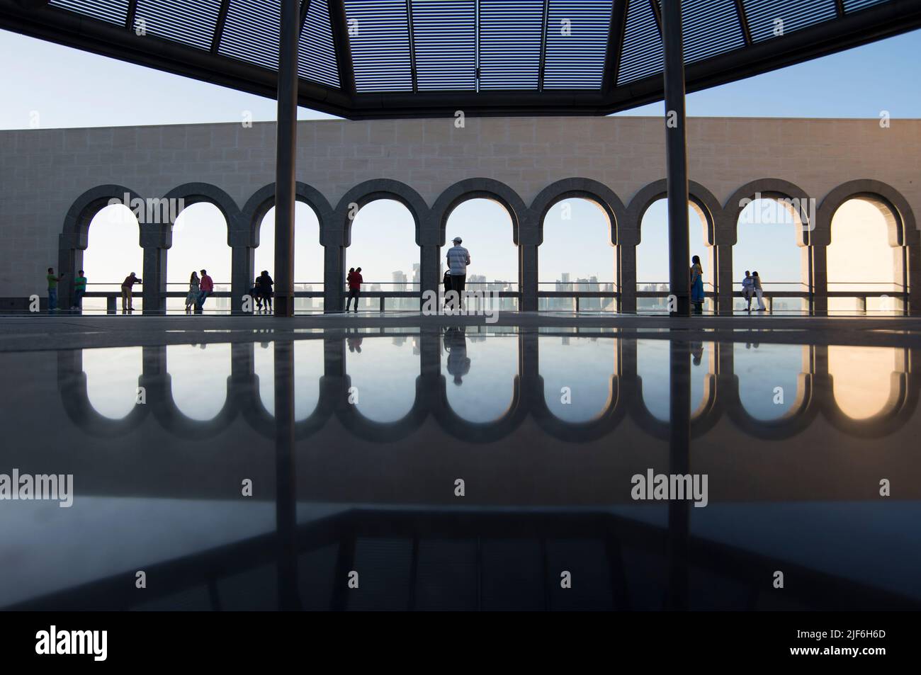 Doha Qatar architectural elements arcs and columns at sunset with ...