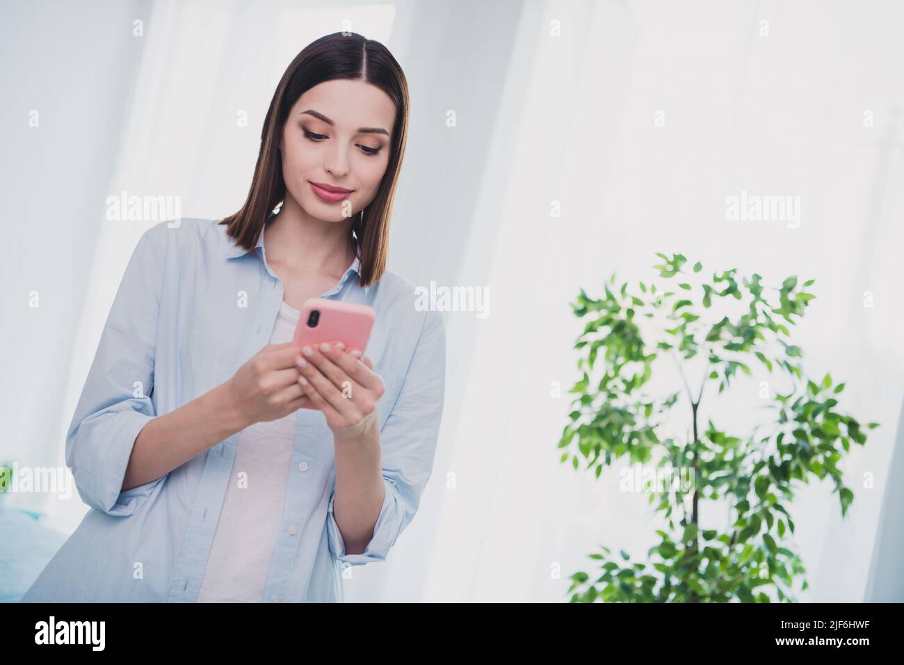 Photo of pretty charming lady hold use telephone write communicate free ...