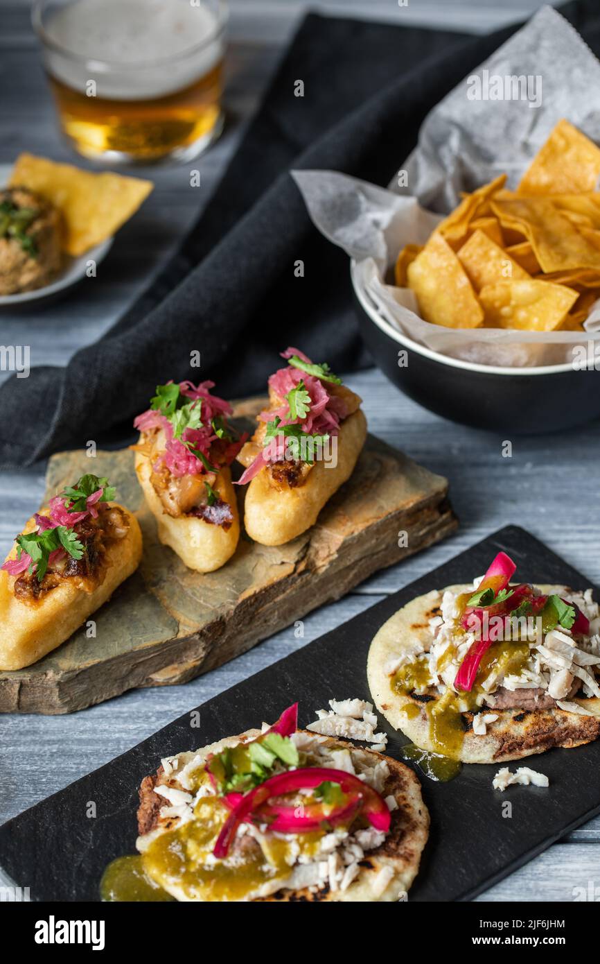 Closeup delicious Mayan polkanes dish with pumpkin seeds and white ...