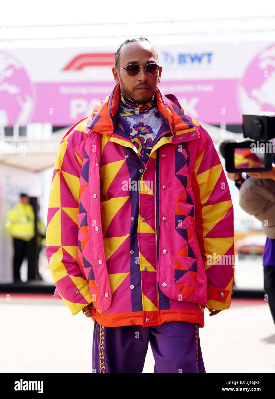 Mercedes' Lewis Hamilton arrives at the paddock ahead of the British ...