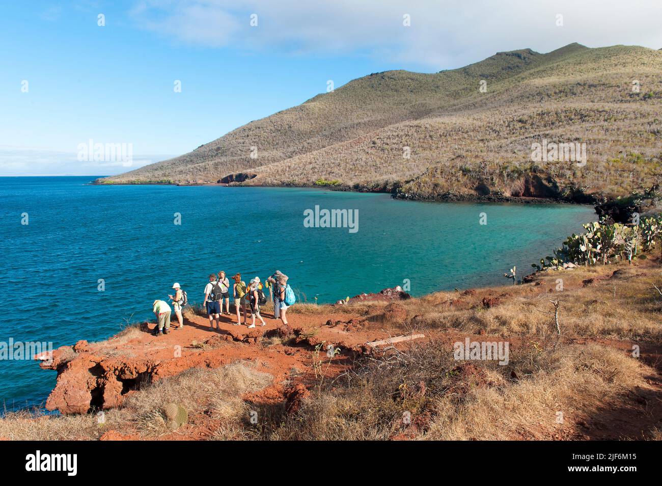 Tourists on the island of Rabida (off the coast of Santiago). This ...