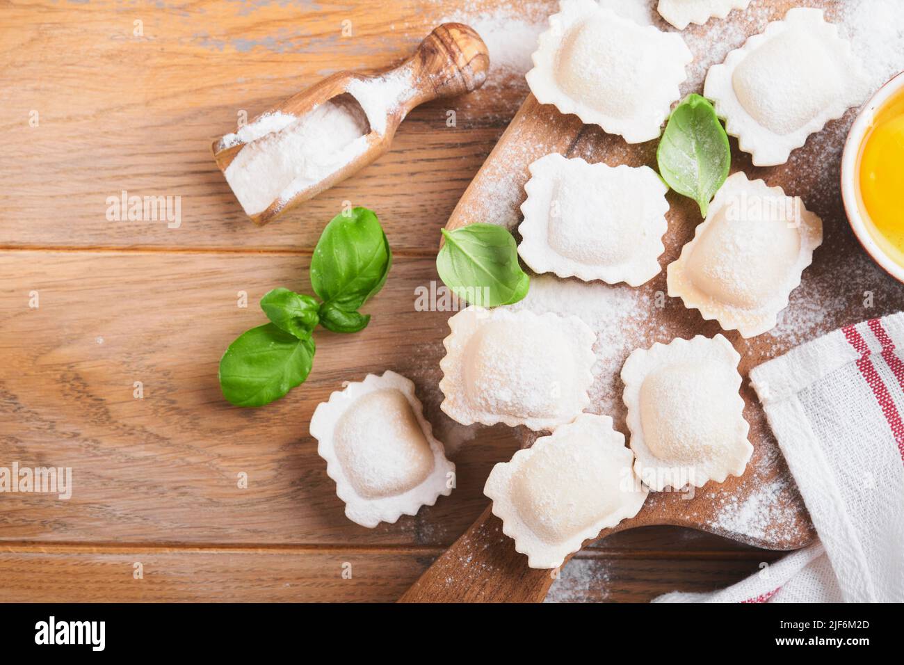 Ravioli Italian food. Tasty homemade pasta ravioli with flour, tomatoes ...