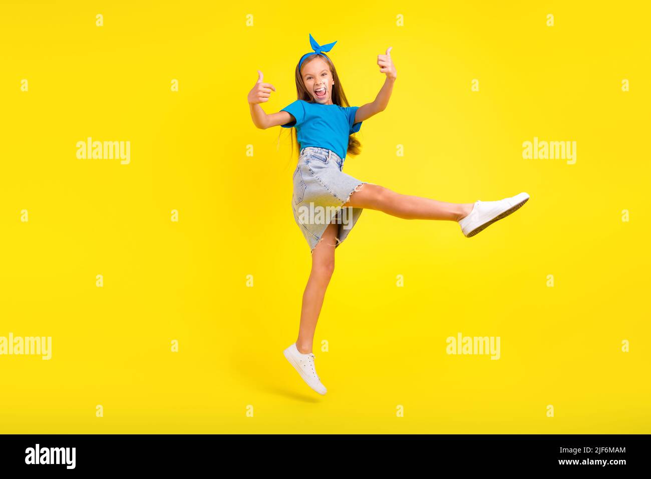 Full size photo of active energetic girl jumping hand fingers ...
