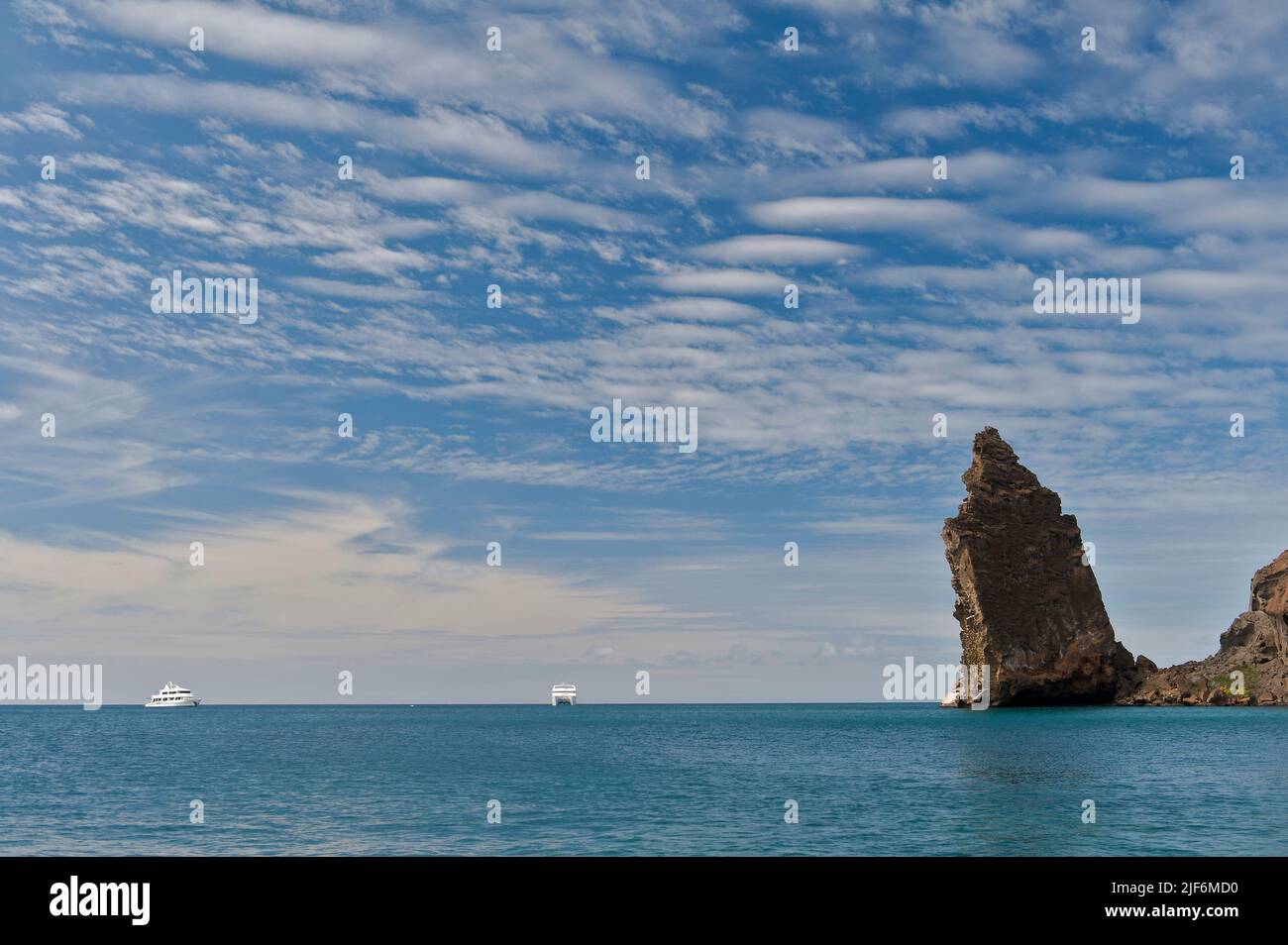 Pinnacle Rock and tourist vessels off the island of Bartolome ...