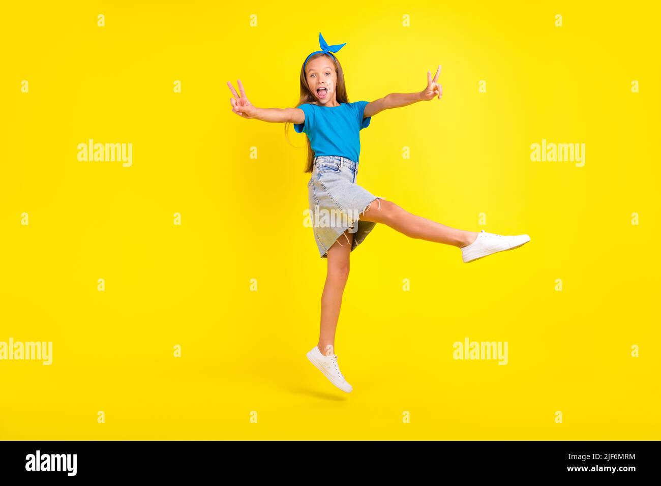 Full length portrait of excited friendly pupil jump hands fingers ...