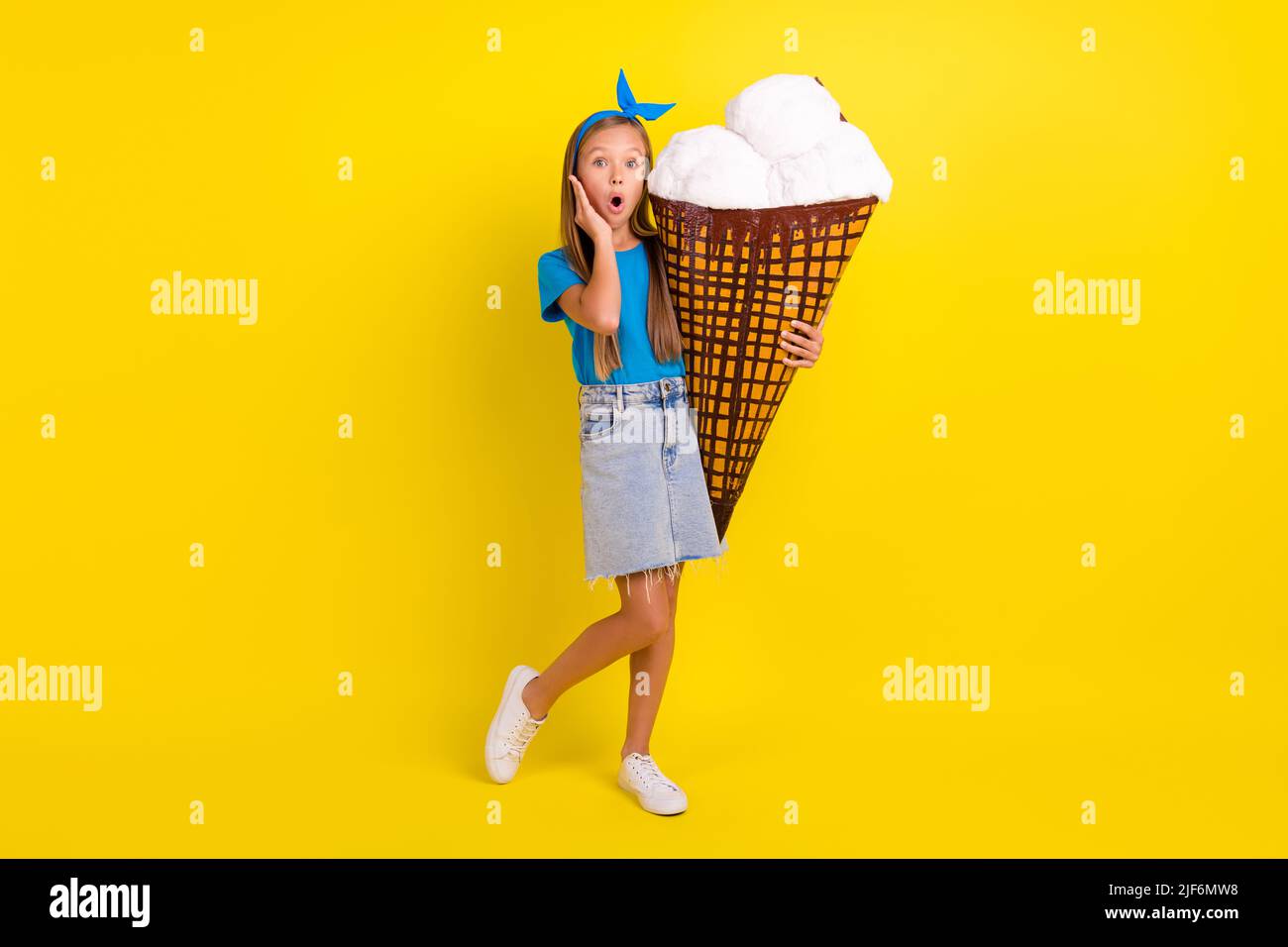 Full body photo of impressed person hand touch cheek hold large ice ...