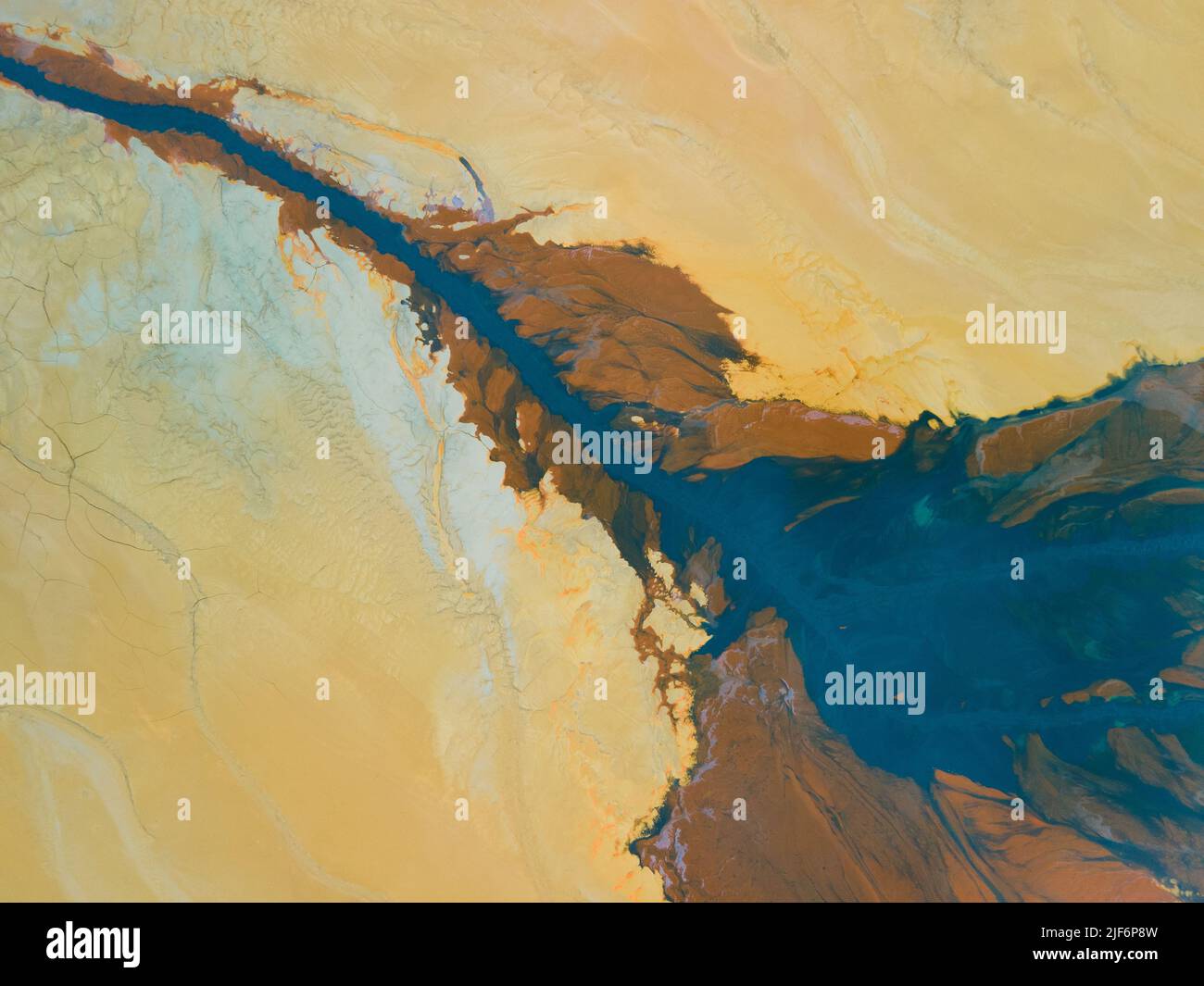 Top view of abstract textured background with colorful yellow and blue ...