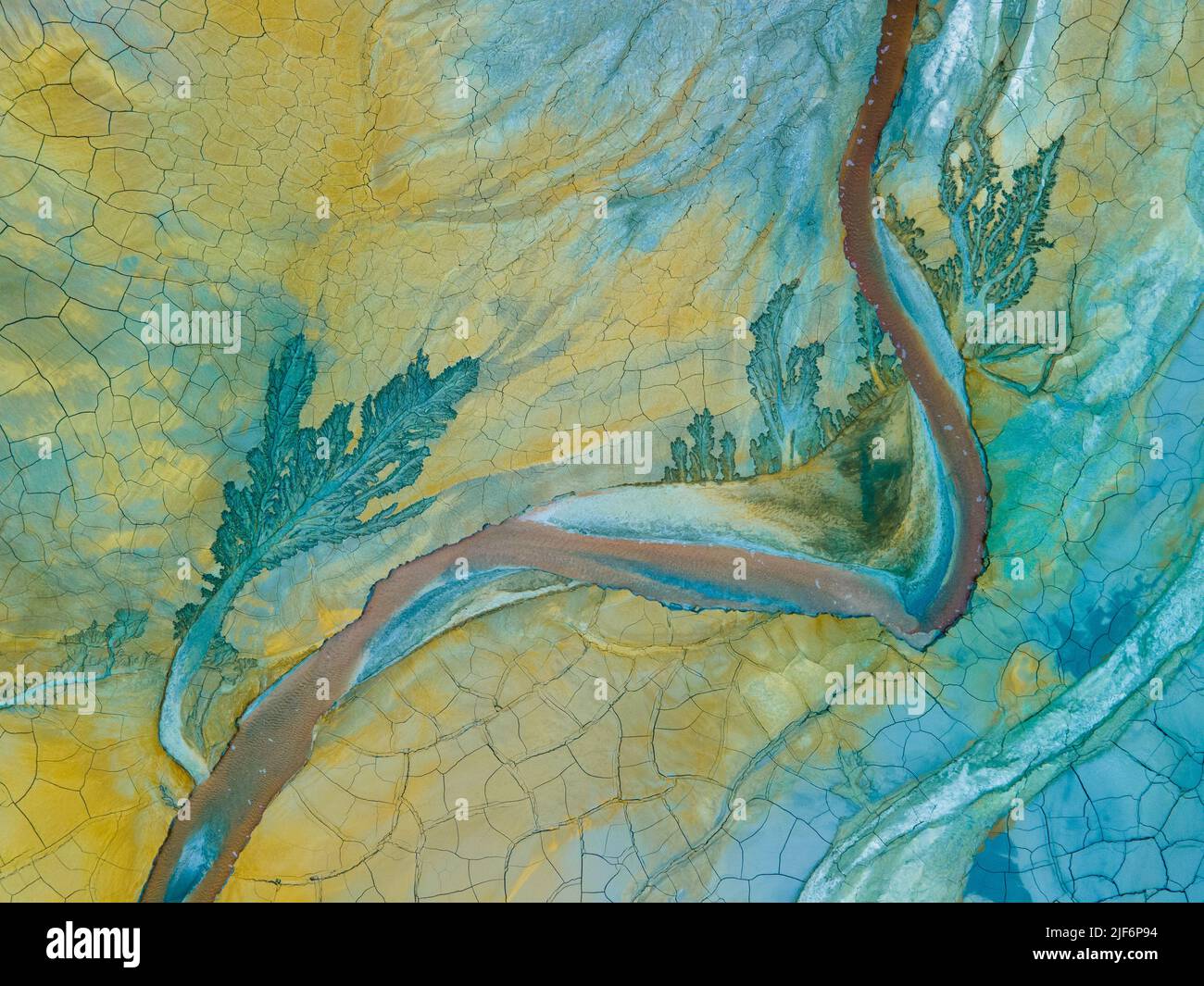 Top view of abstract textured background with colorful yellow and blue ...