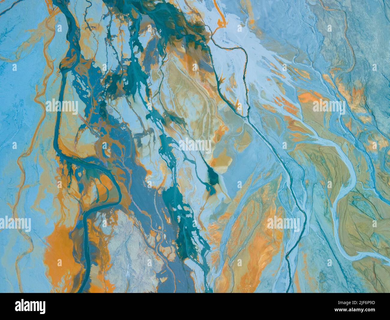 Top view of abstract textured background with colorful yellow and blue ...