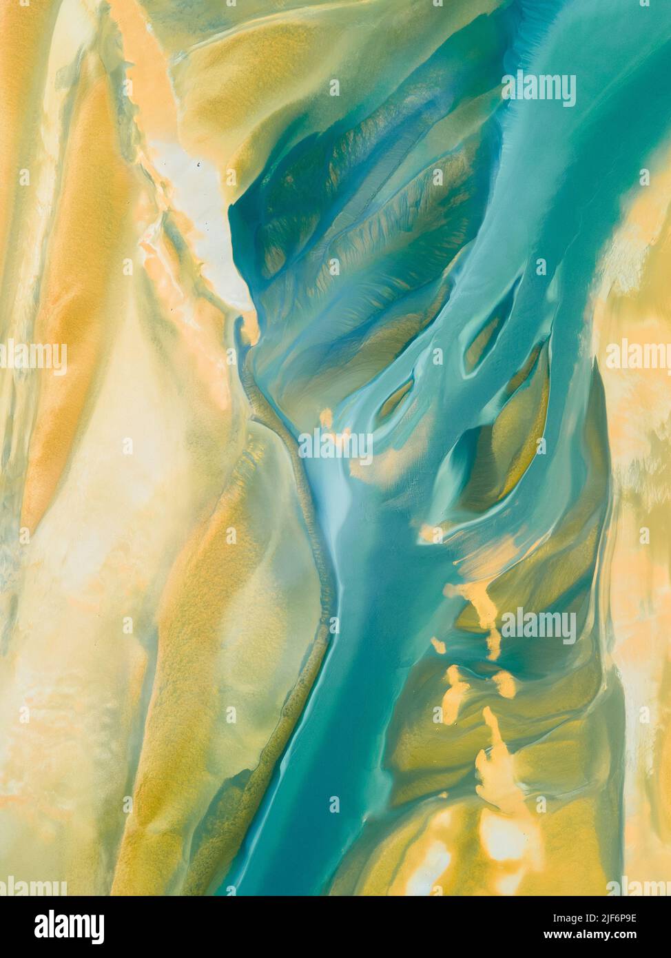 Top view of abstract textured background with colorful yellow and blue ...