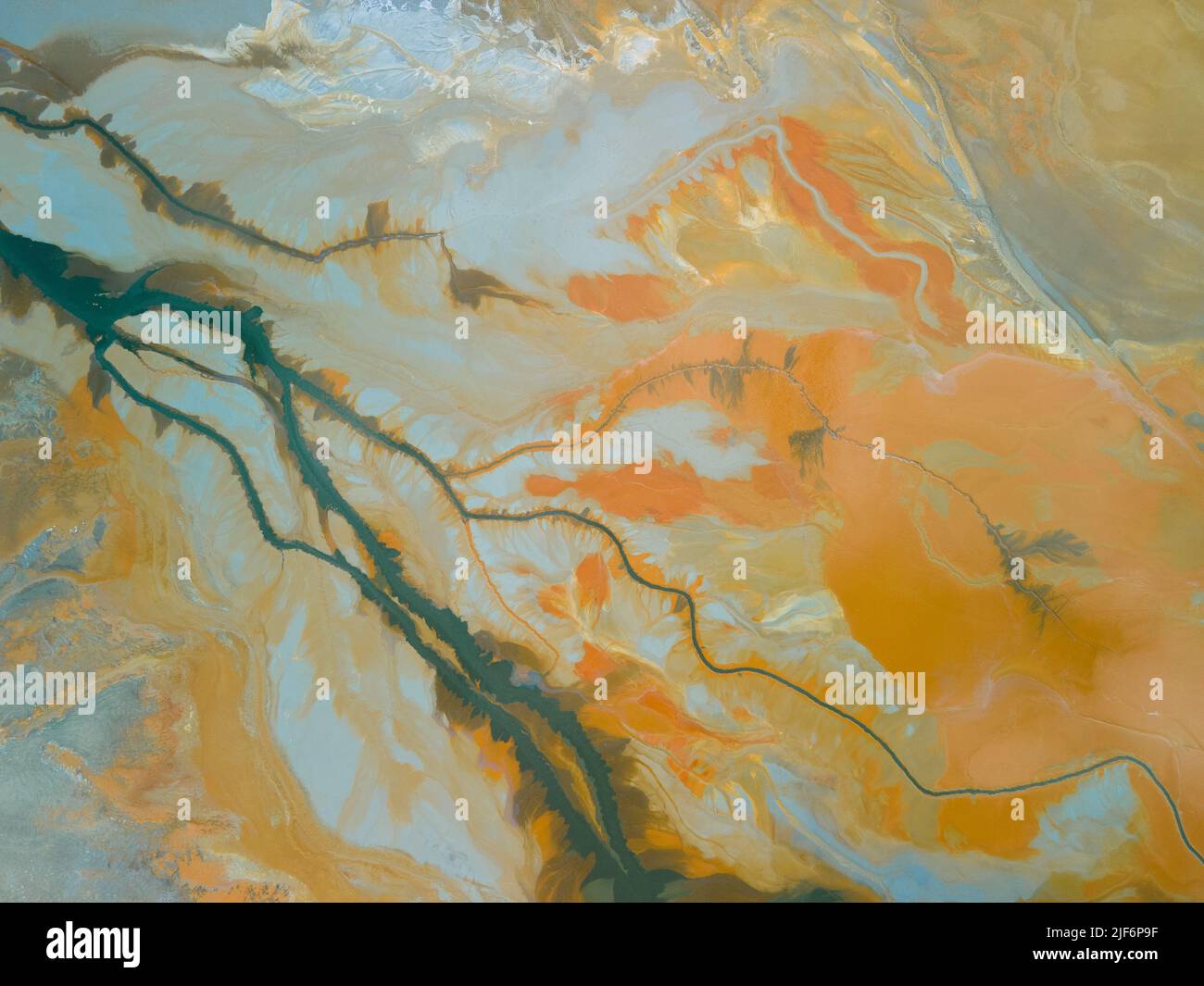 Top view of abstract textured background with colorful yellow and blue ...