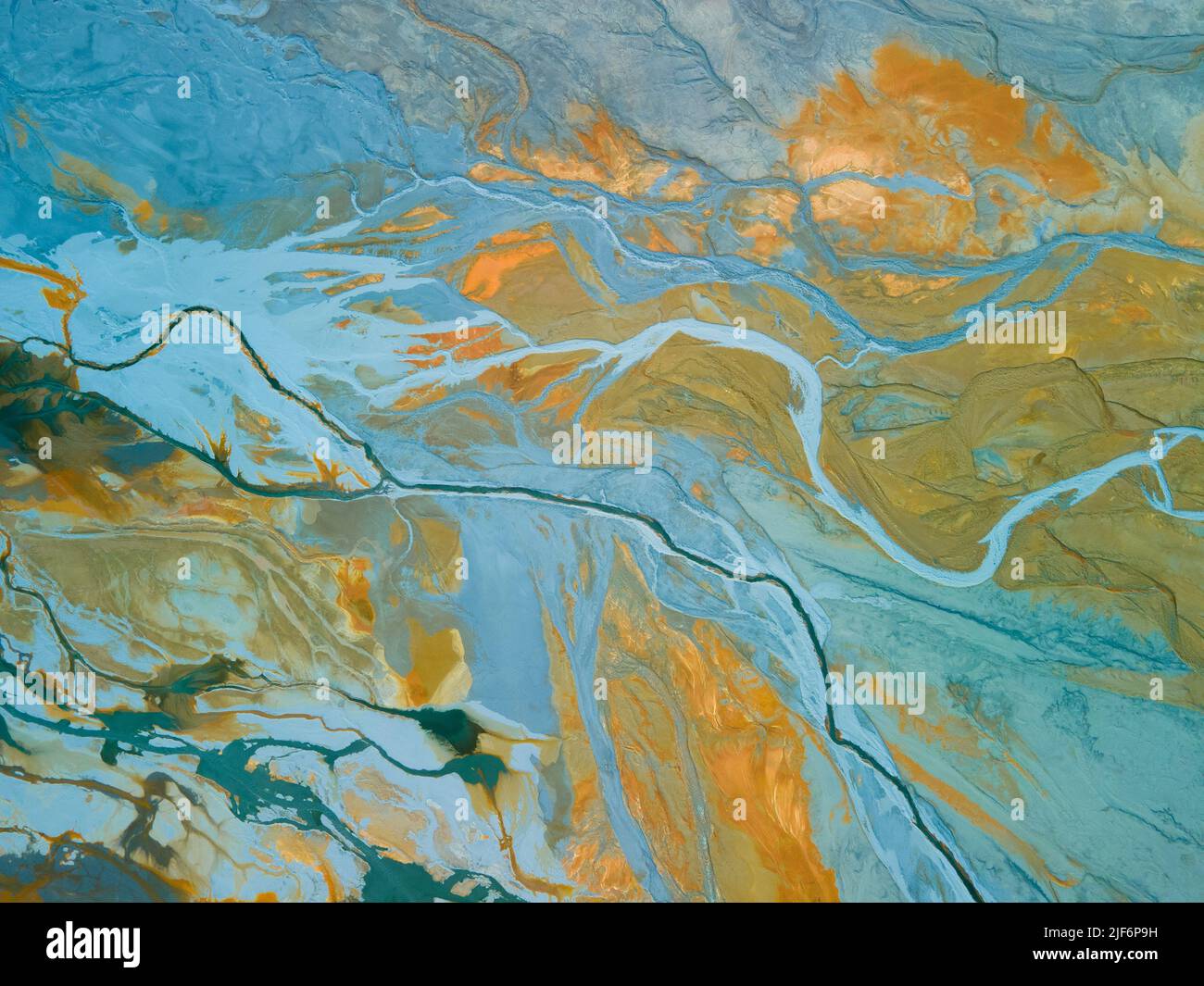 Top view of abstract textured background with colorful yellow and blue ...