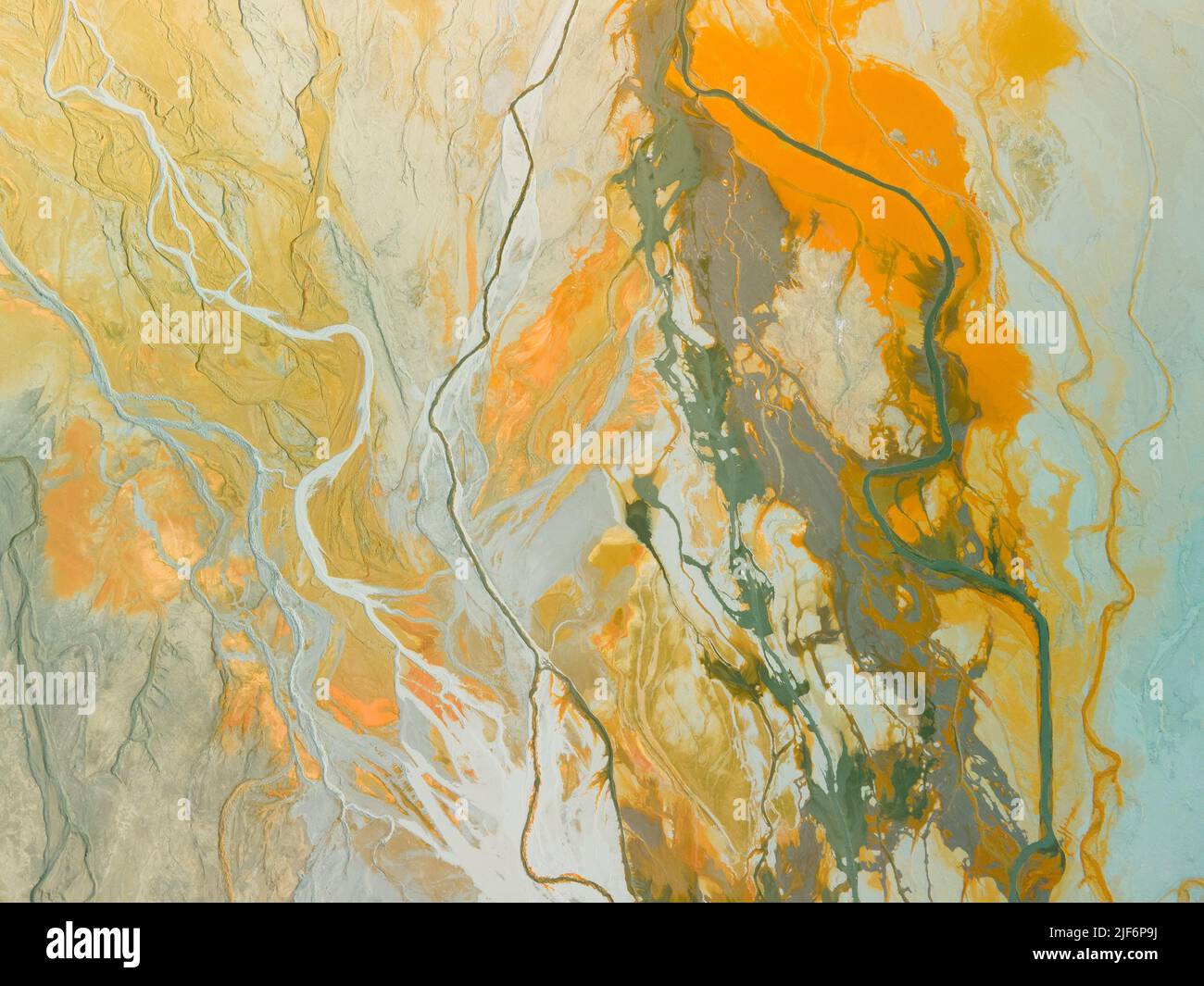 Top view of abstract textured background with colorful yellow and blue ...