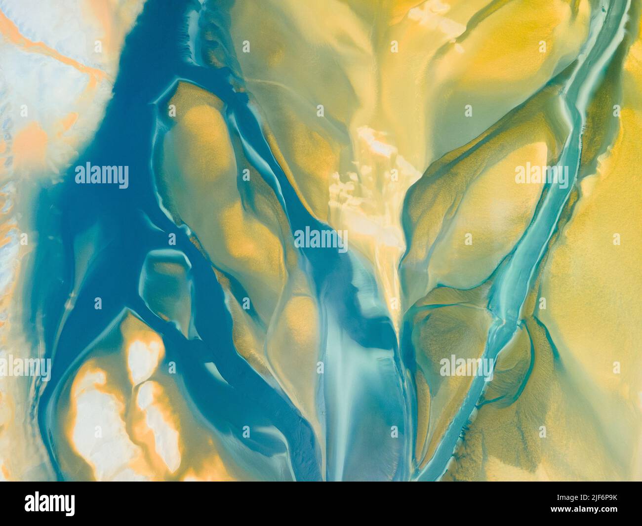 Top view of abstract textured background with colorful yellow and blue ...