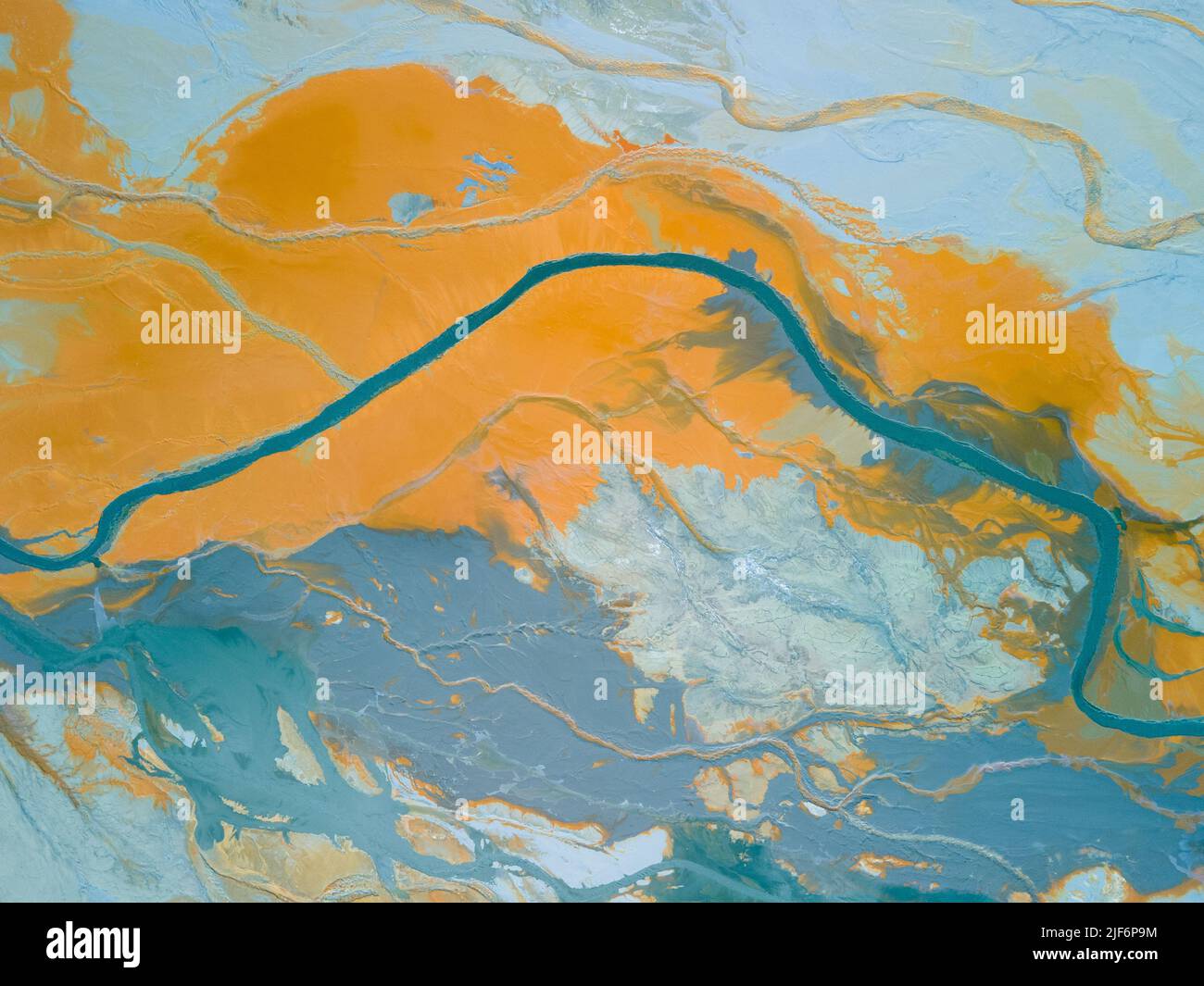 Top view of abstract textured background with colorful yellow and blue ...