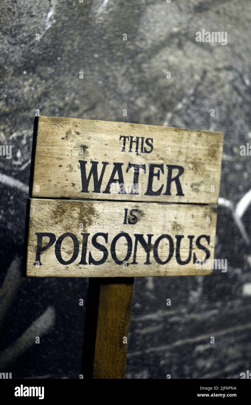utilitarian poison water sign Stock Photo - Alamy
