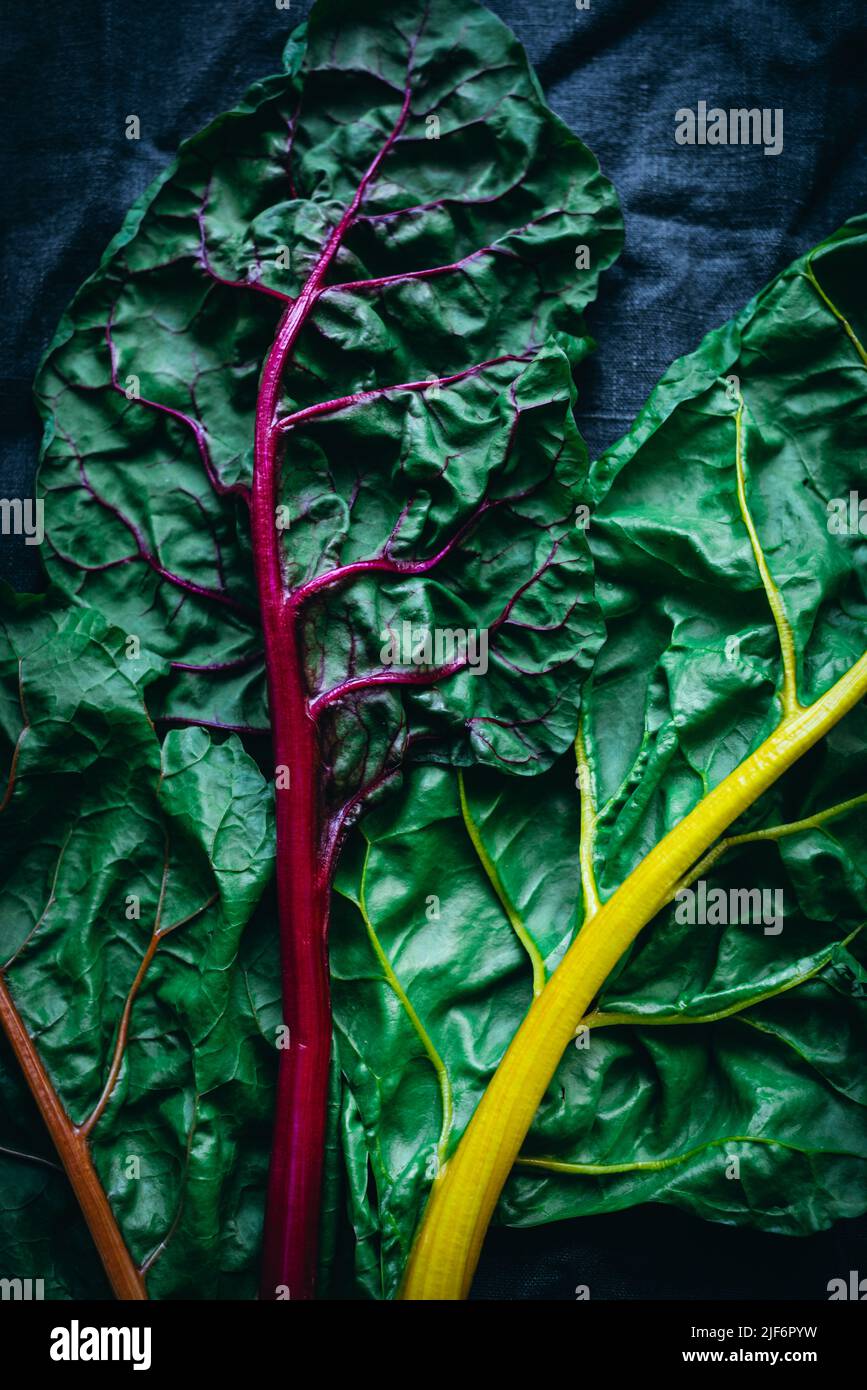 Top view of green chard leaves on the table Stock Photo - Alamy