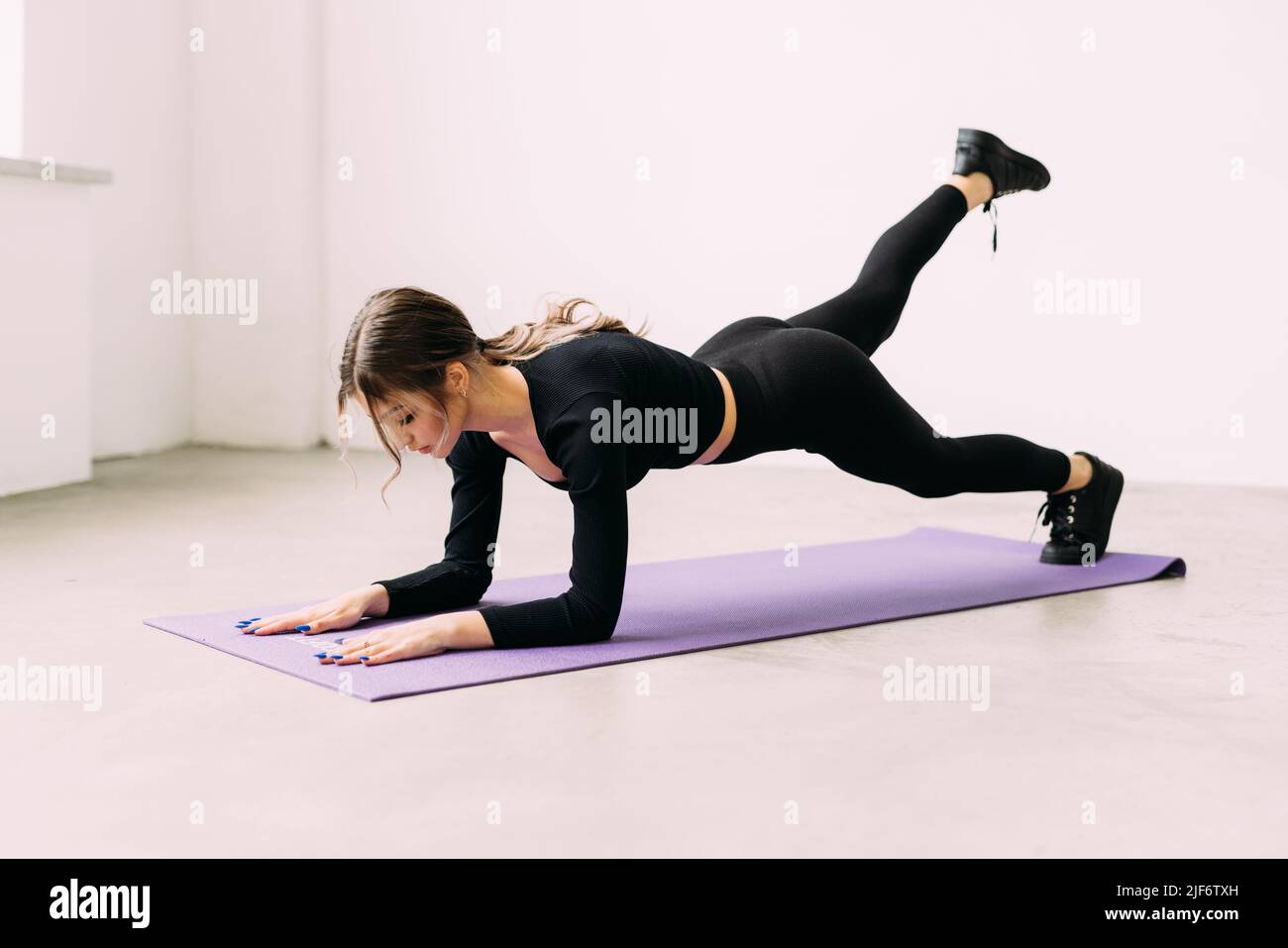 Exercise workout at home fit woman training core exercising abs with ...