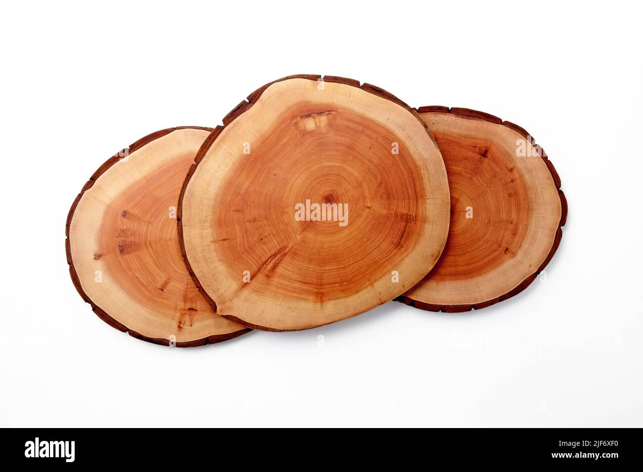 Wooden cutting boards isolated on white background. Tree trunk cut for ...